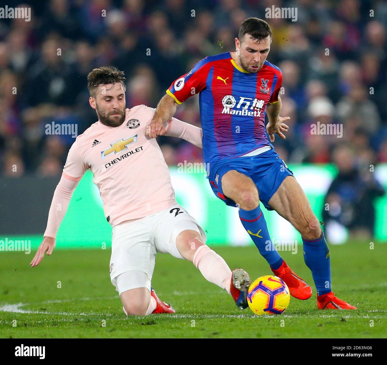 Manchester United's Luke Shaw (left) and Crystal Palace's James ...