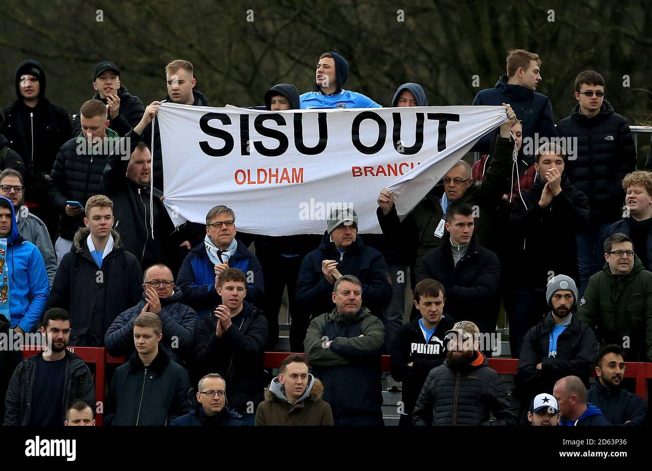 Coventry City fans hold up a banner in protest at the clubs owners ...