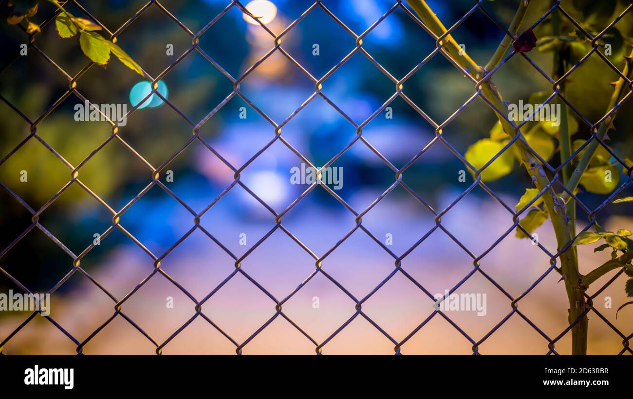 Chain link fence night hi-res stock photography and images - Alamy