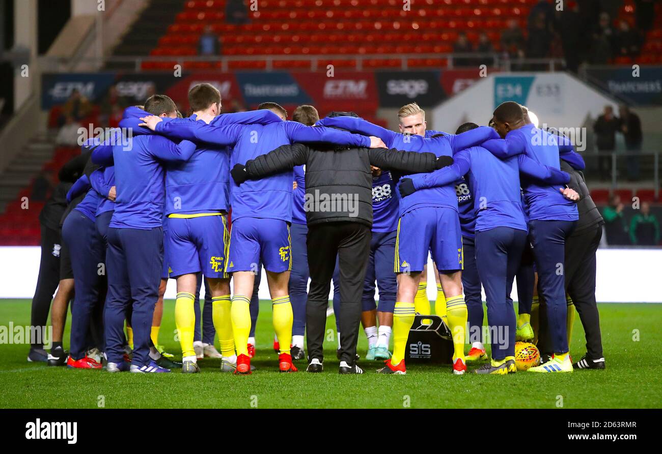 Birmingham City team in a huddle ahead of the match Stock Photo - Alamy