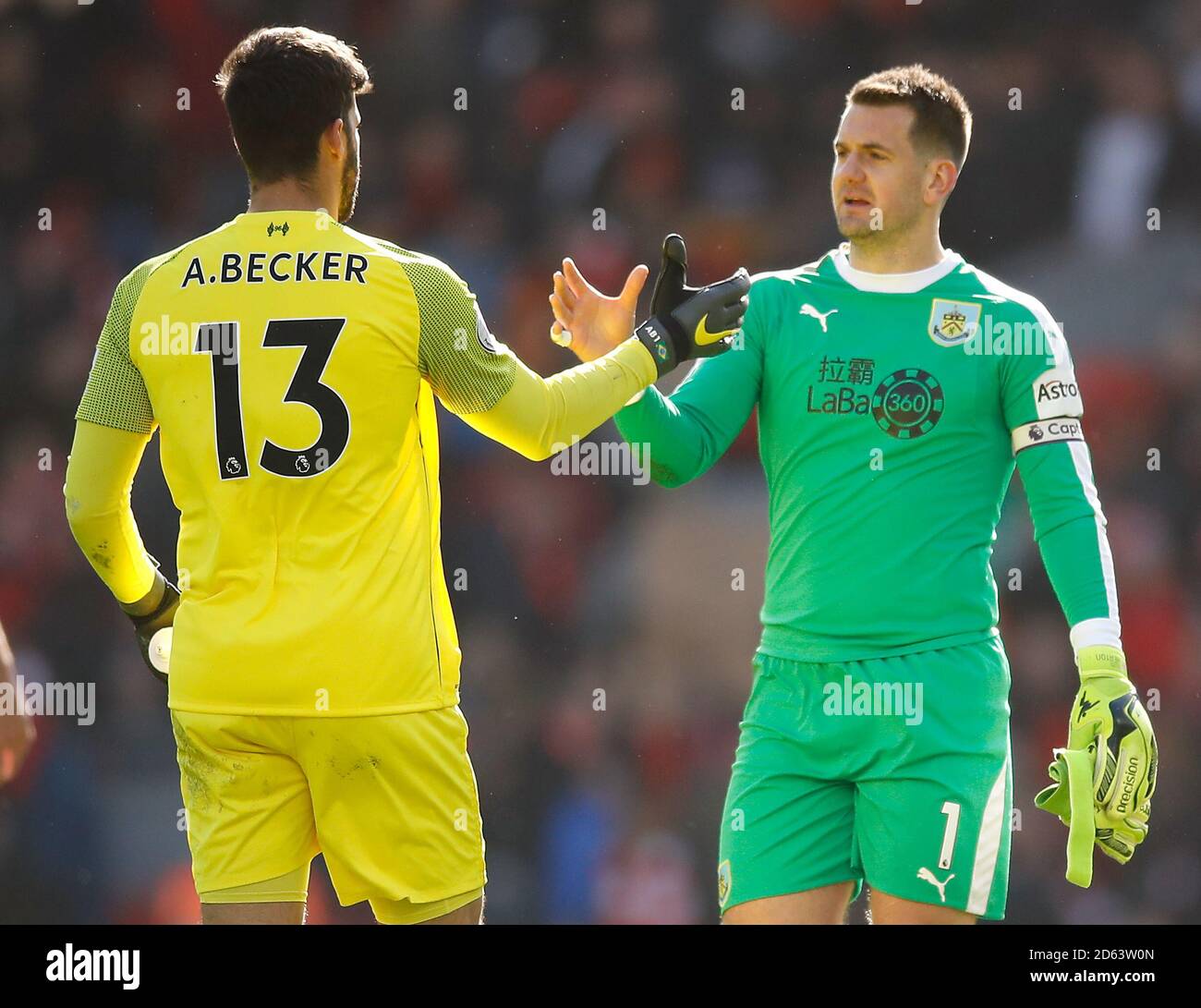 Liverpool goalkeeper Alisson Becker (left) and Burnley goalkeeper ...