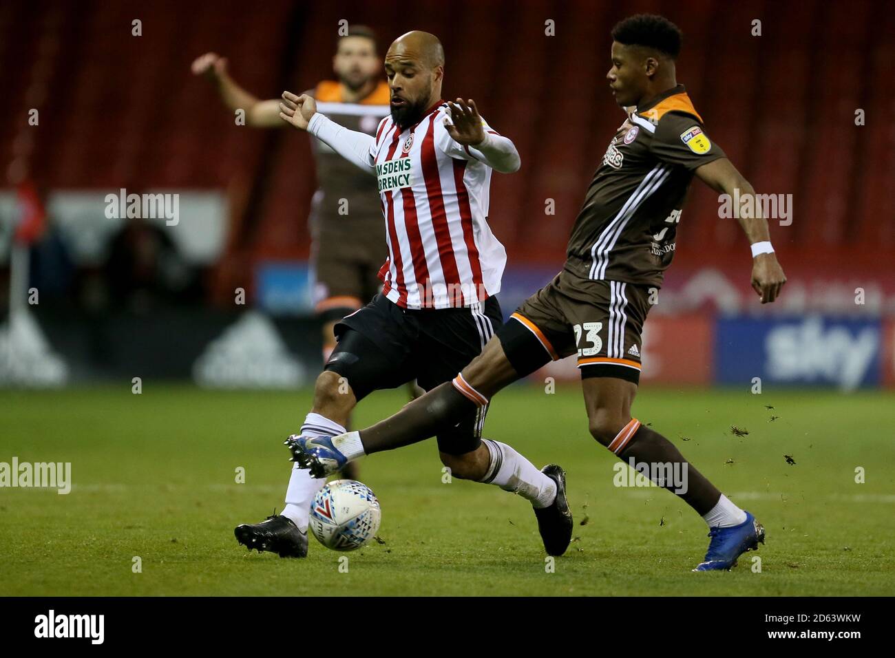 Sheffield United's David McGoldrick and Brentford's Julian Jeanvier ...