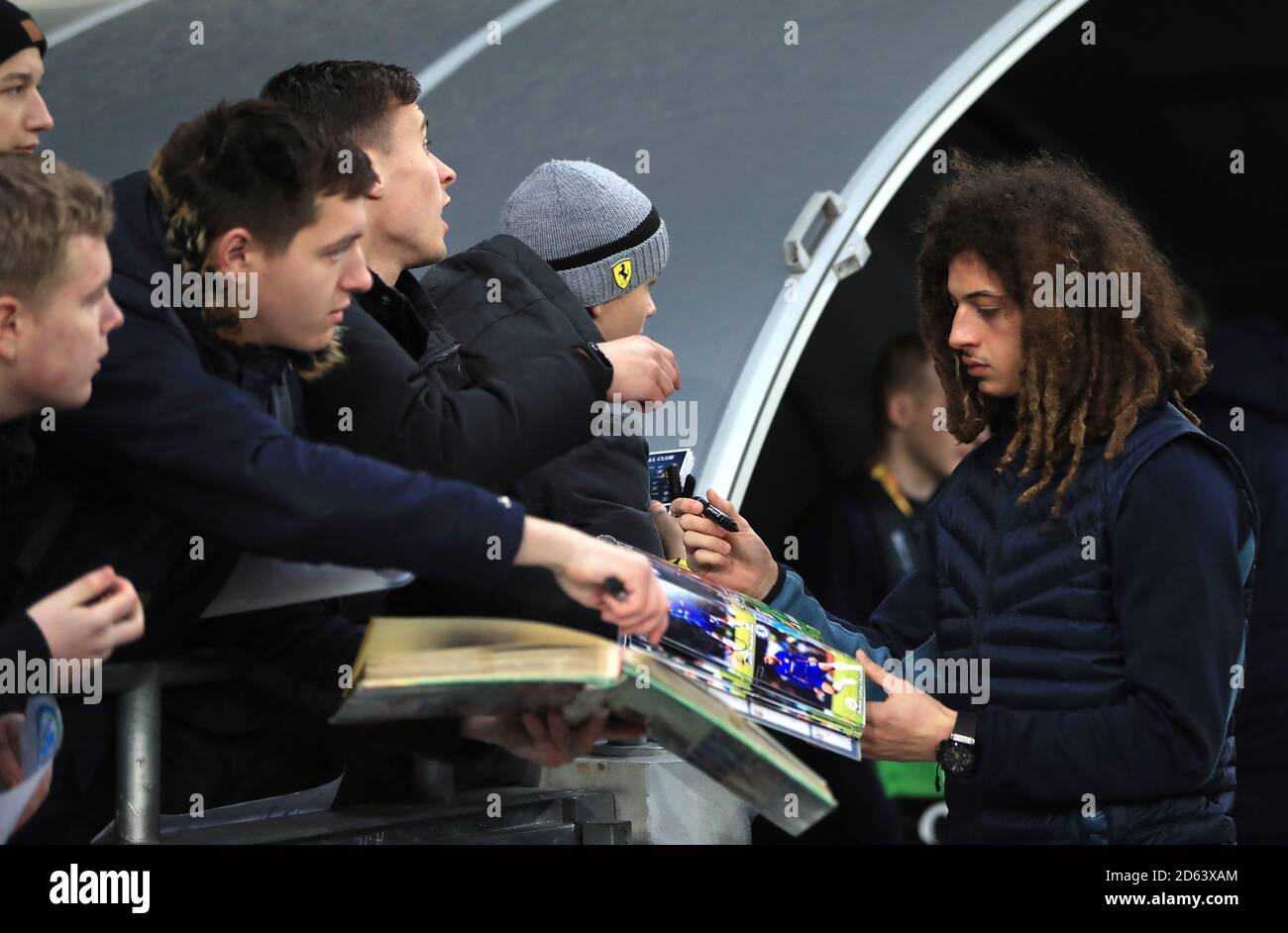 Chelsea's Ethan Ampadu signs autographs for fans prior to the match ...