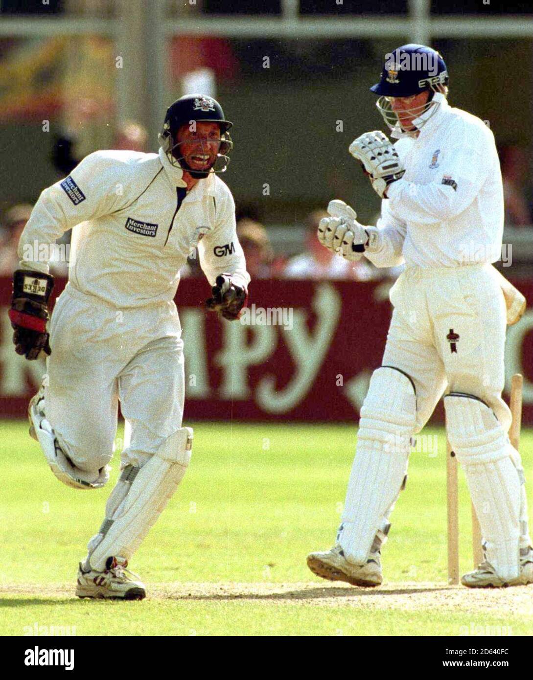 Gloucester's wicket-keeper Reggie Williams runs along the pitch to ...