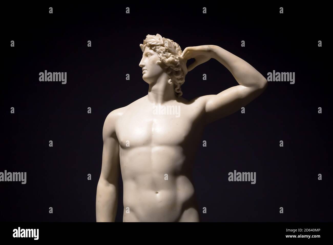 MILAN, ITALY - June 2020: the ancient sculpture Apollo Crowning Himself ...