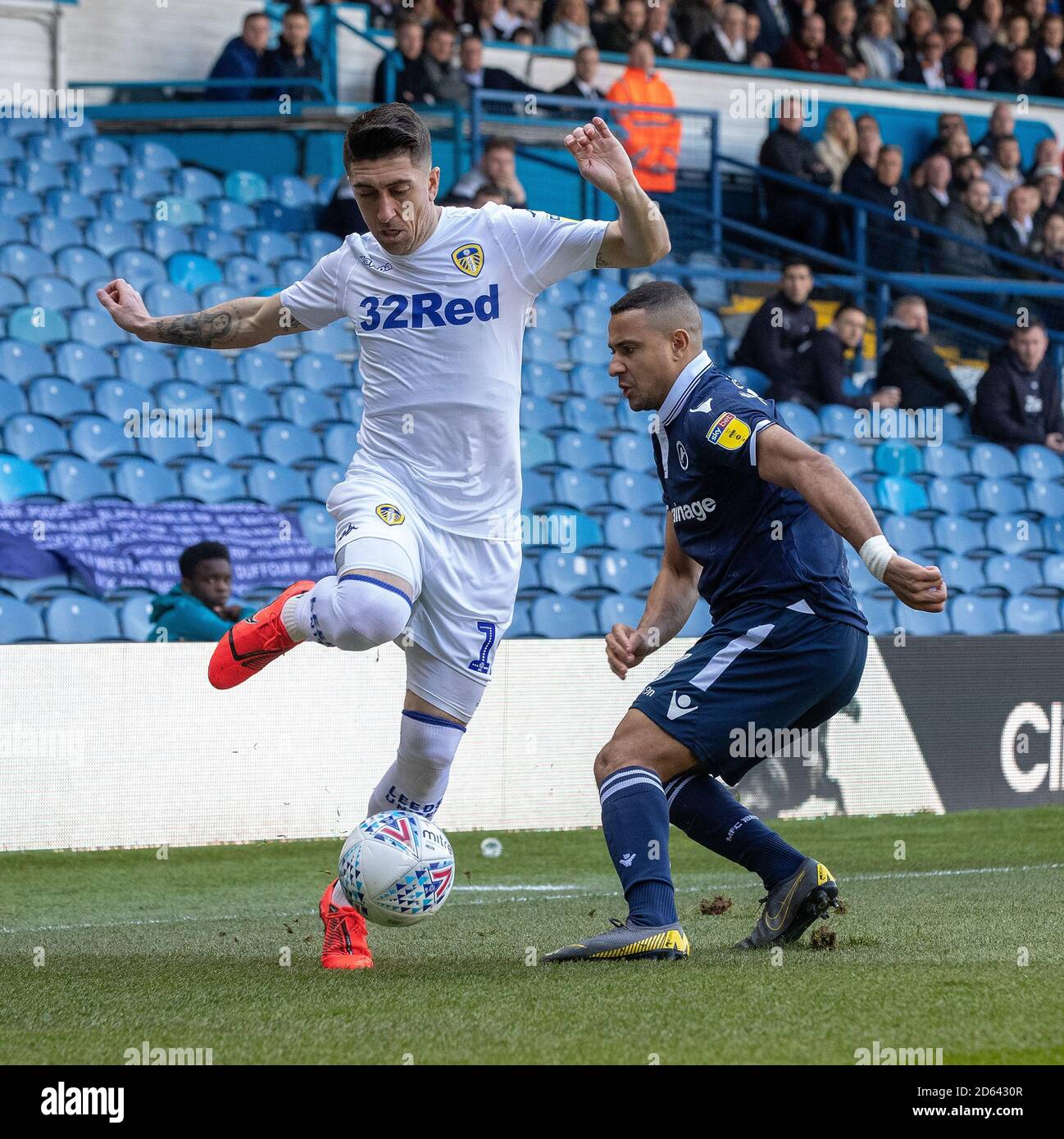 Leeds United's Pablo Hernandez (left) and Millwall's James Meredith ...