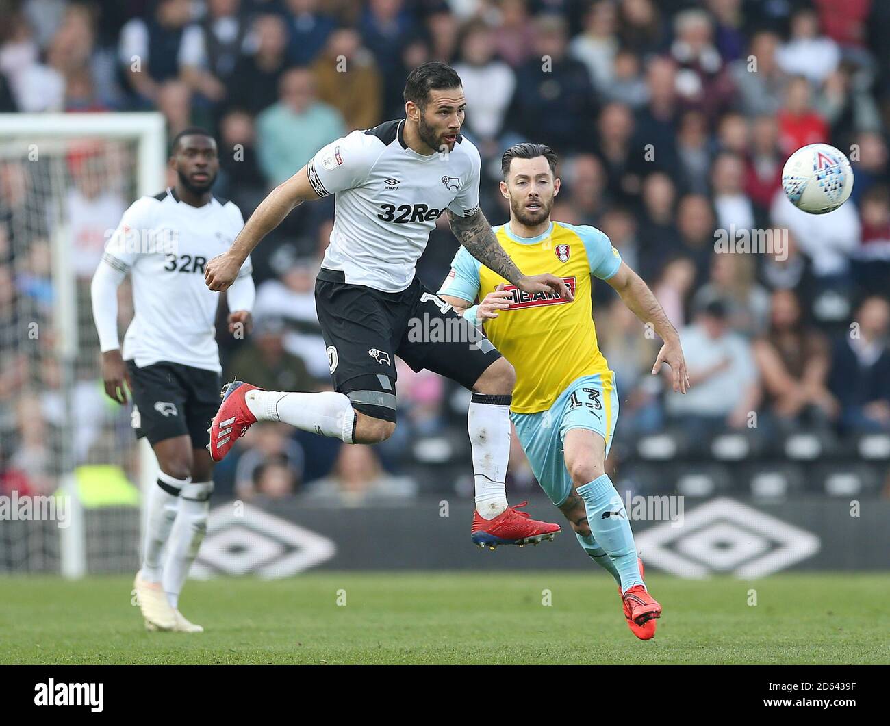 Derby County's Bradley Johnson and Rotherham United's Richie Towell ...