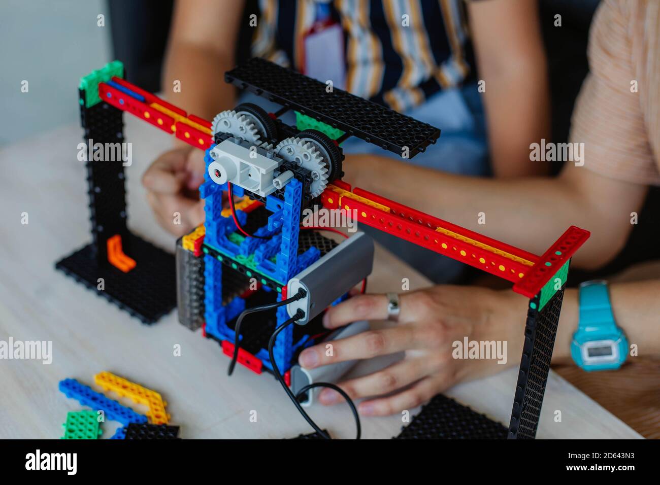 schoolboy study in a robotics class, assemble a robot constructor Stock ...