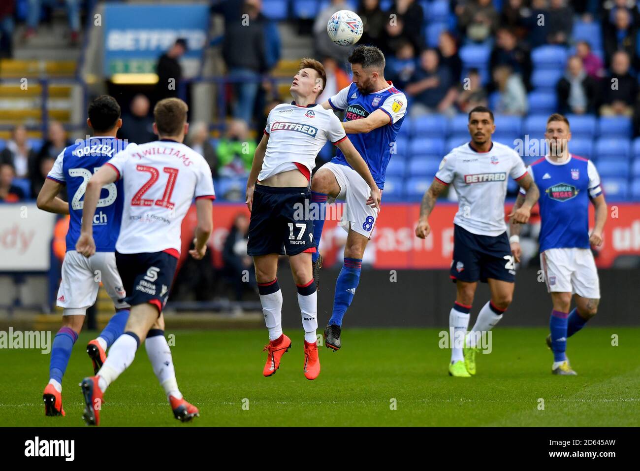 Ipswich Town's Cole Skuse and Bolton Wanderers' Callum Connolly compete ...