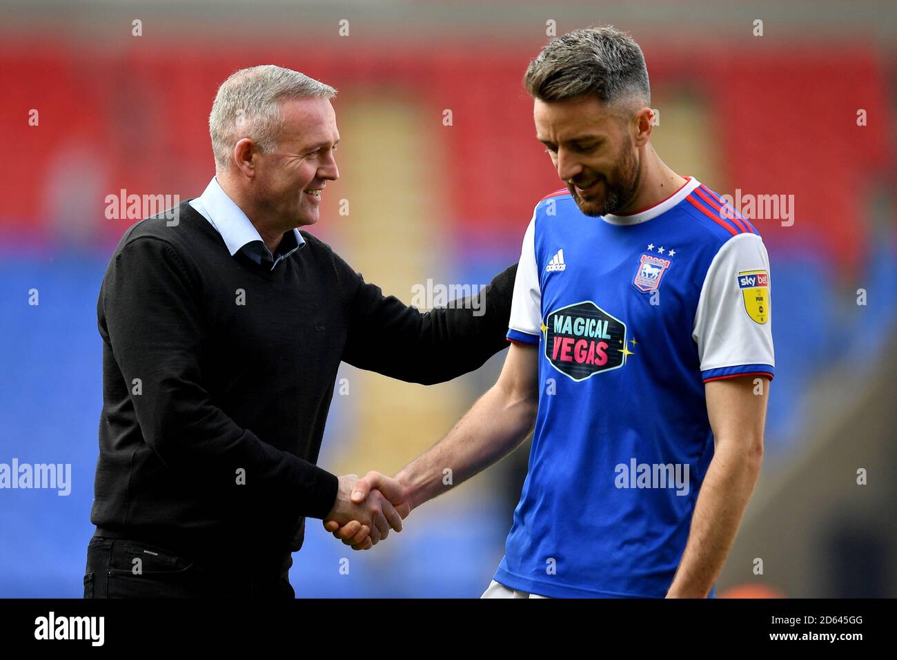 Ipswich Town manager Paul Lambert shakes hands with Ipswich Town's Cole ...