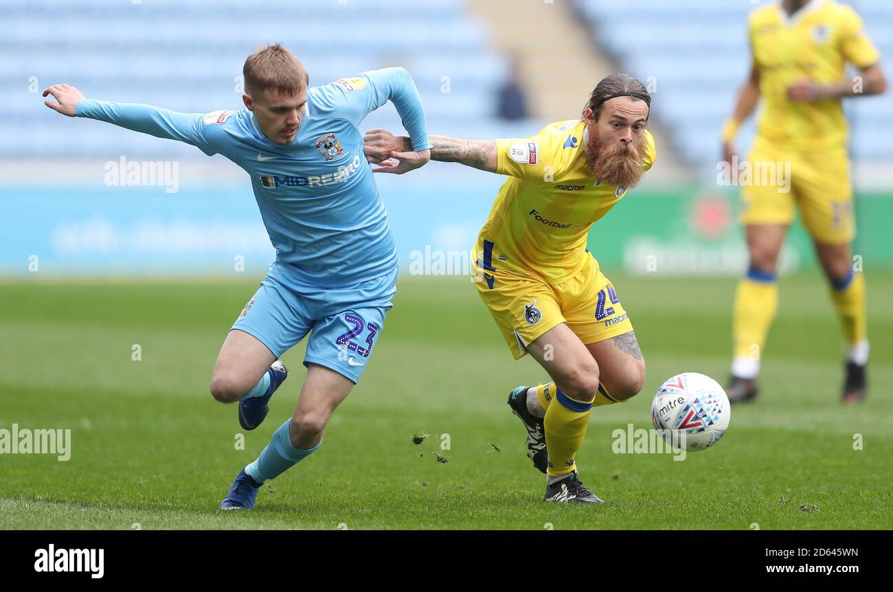 Coventry City's Luke Thomas and Bristol Rovers' Stuart Sinclair battle ...