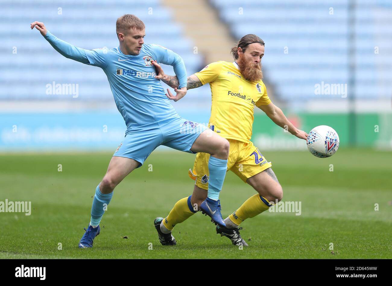 Coventry City's Luke Thomas and Bristol Rovers' Stuart Sinclair battle ...