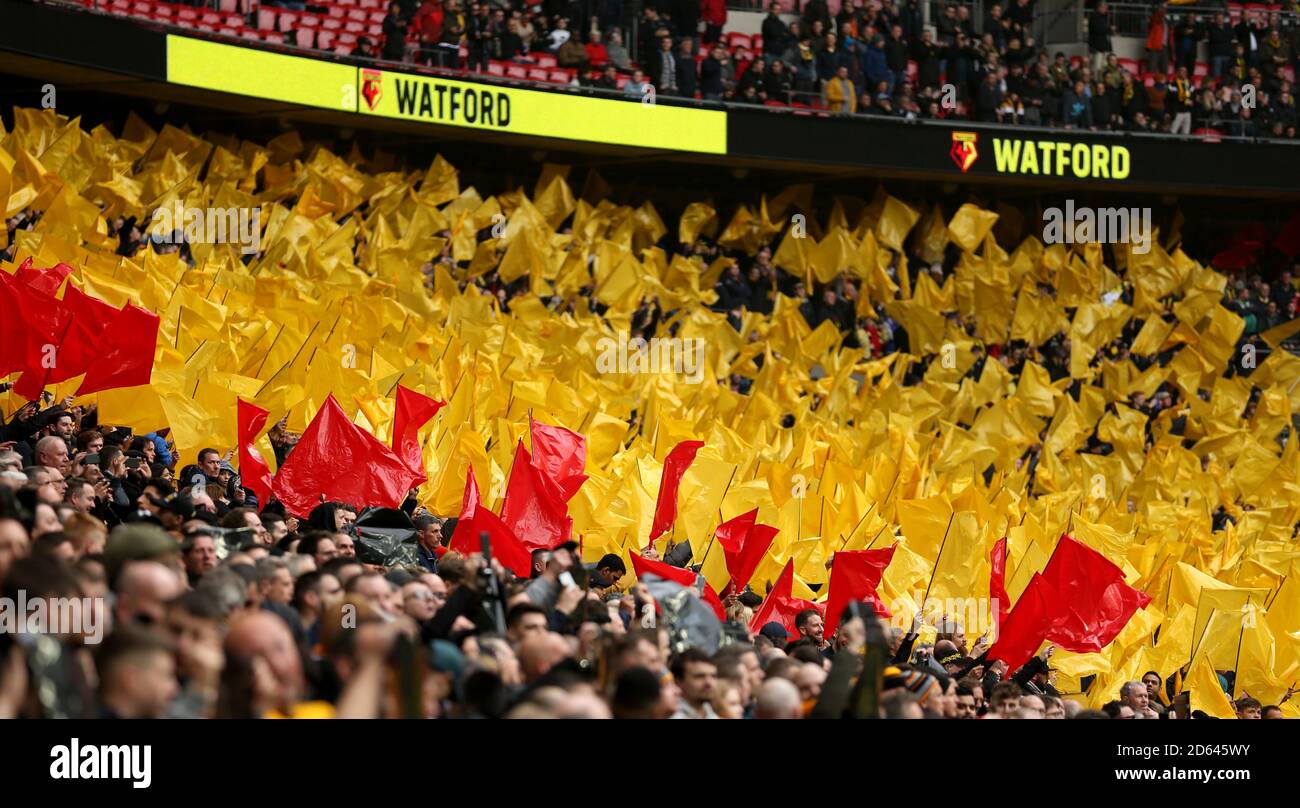 Watford fans wave flags prior to kick-off Stock Photo - Alamy