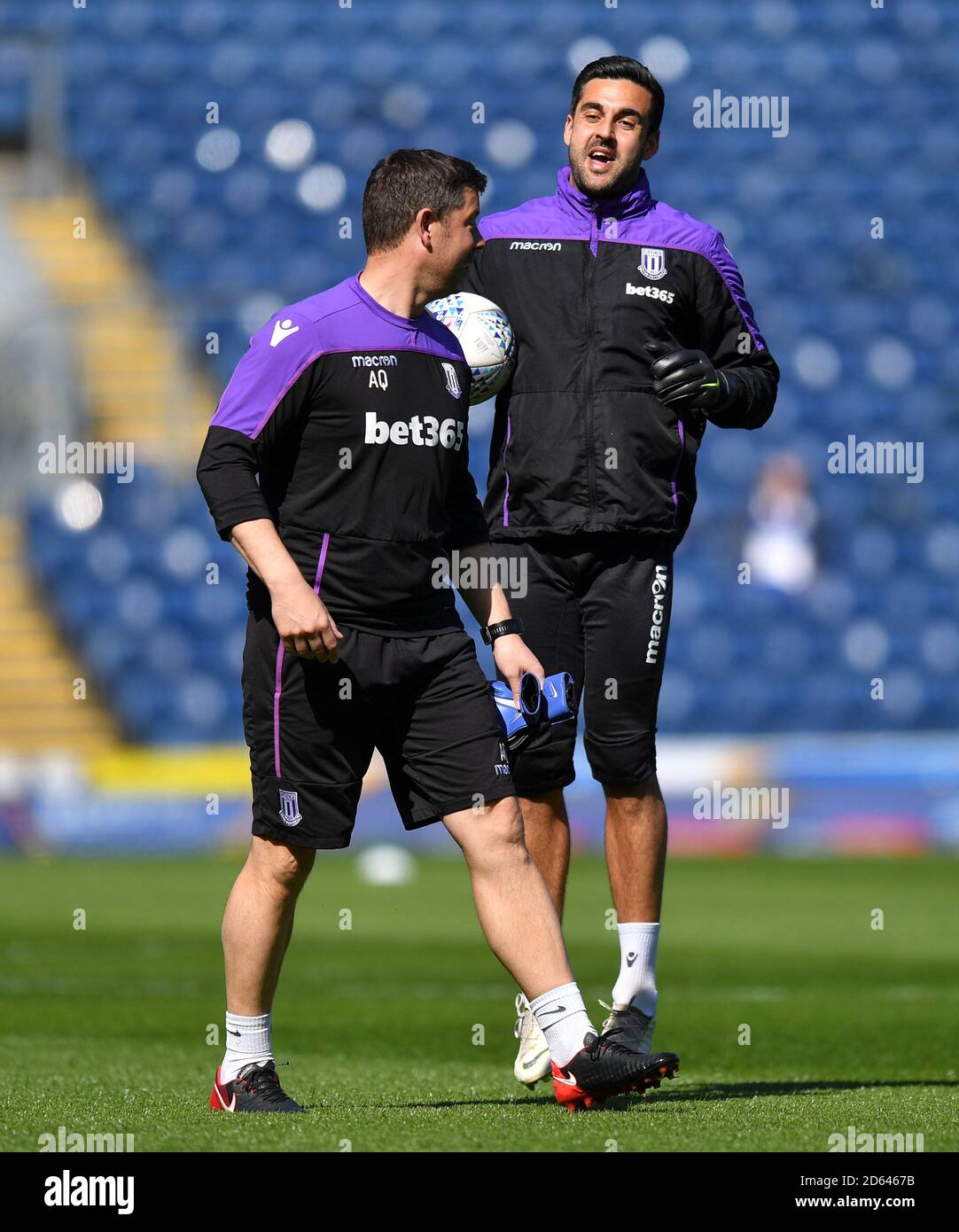 Stoke City goalkeeper Adam Federici (right) warming up prior to kick ...