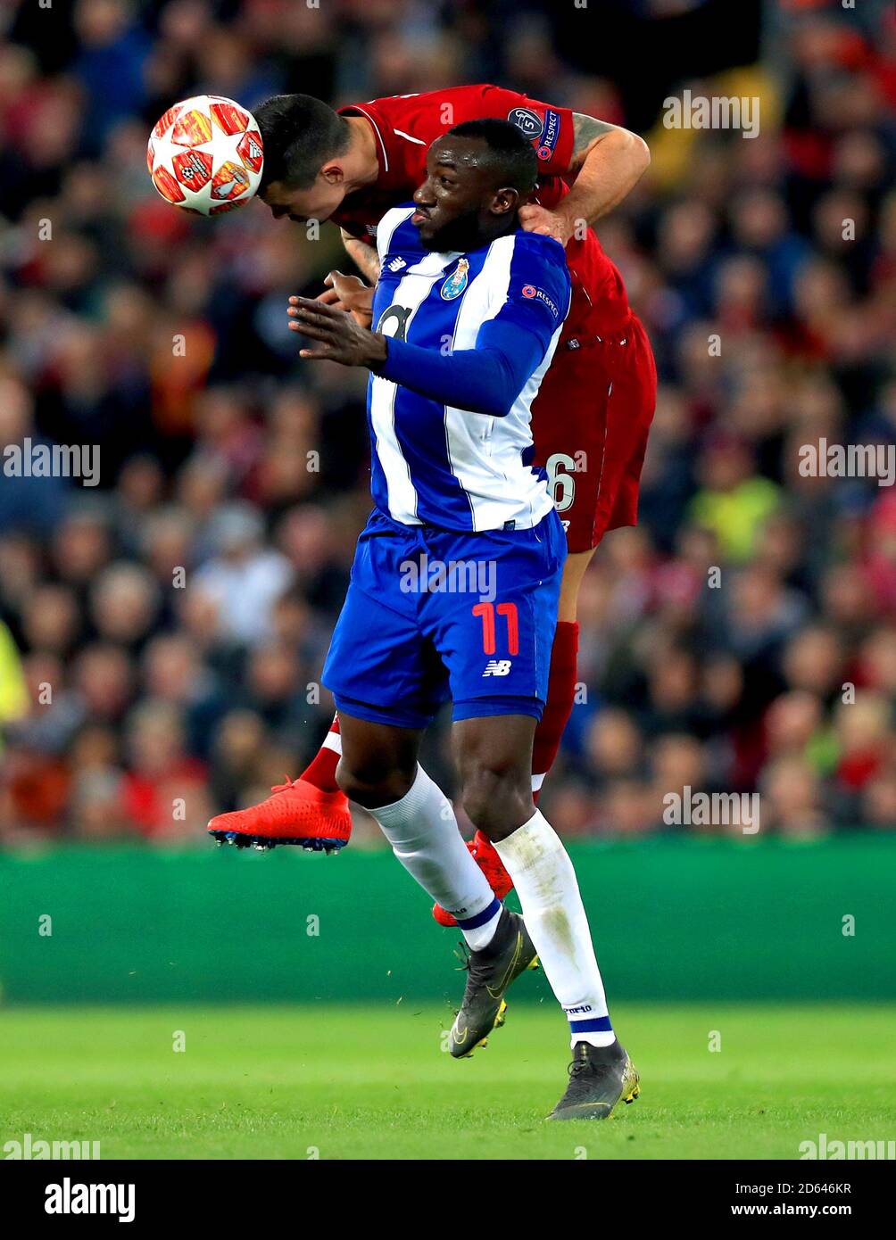 FC Porto's Moussa Marega (left) and Liverpool's Dejan Lovren battle for ...
