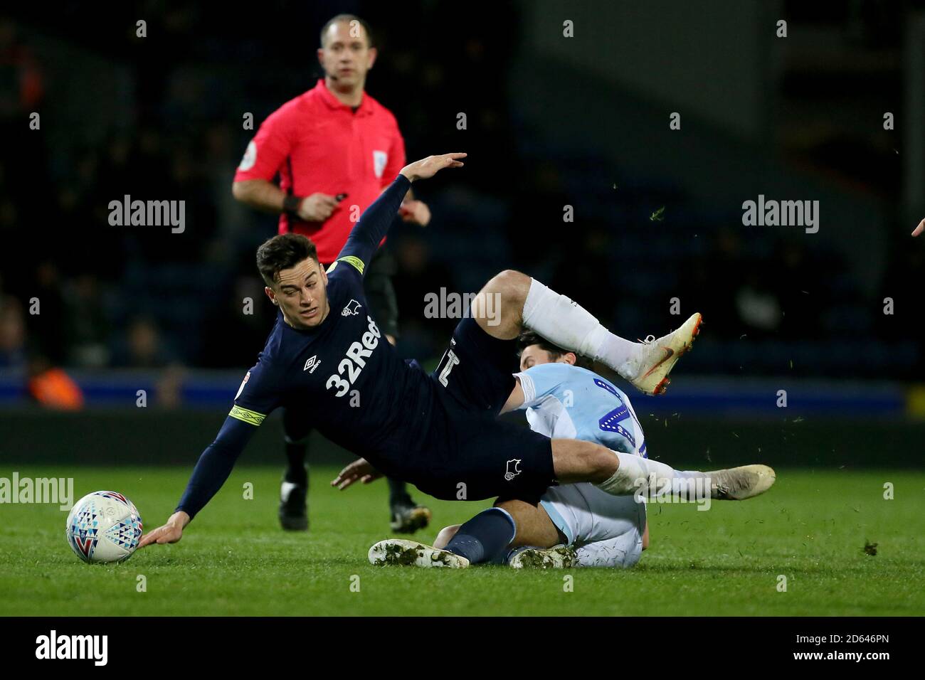 Blackburn Rovers' Lewis Travis fouls Derby County's Tom Lawrence Stock ...