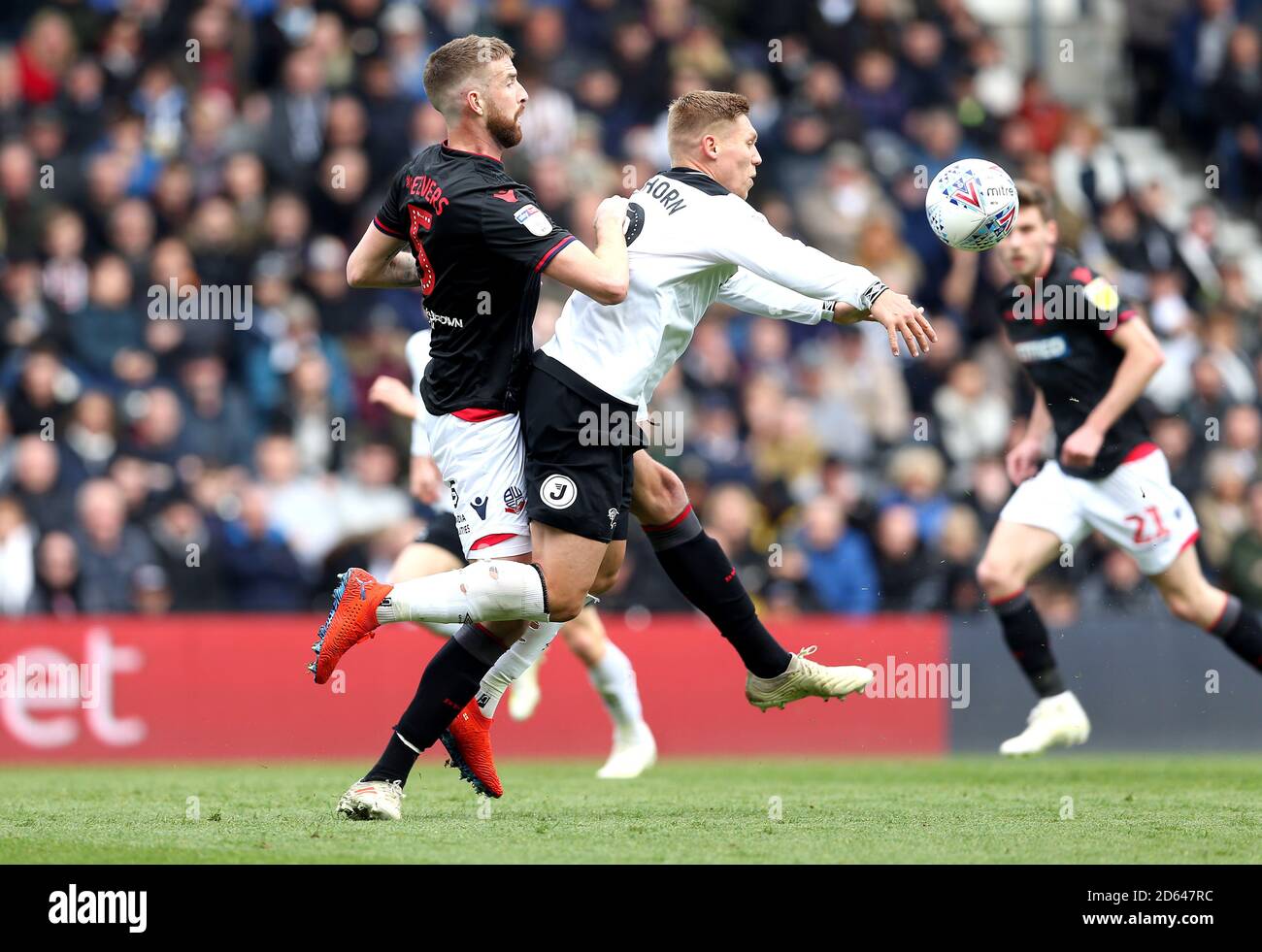 Bolton Wanderers' Mark Beevers (left) and Derby County's Martyn Waghorn ...