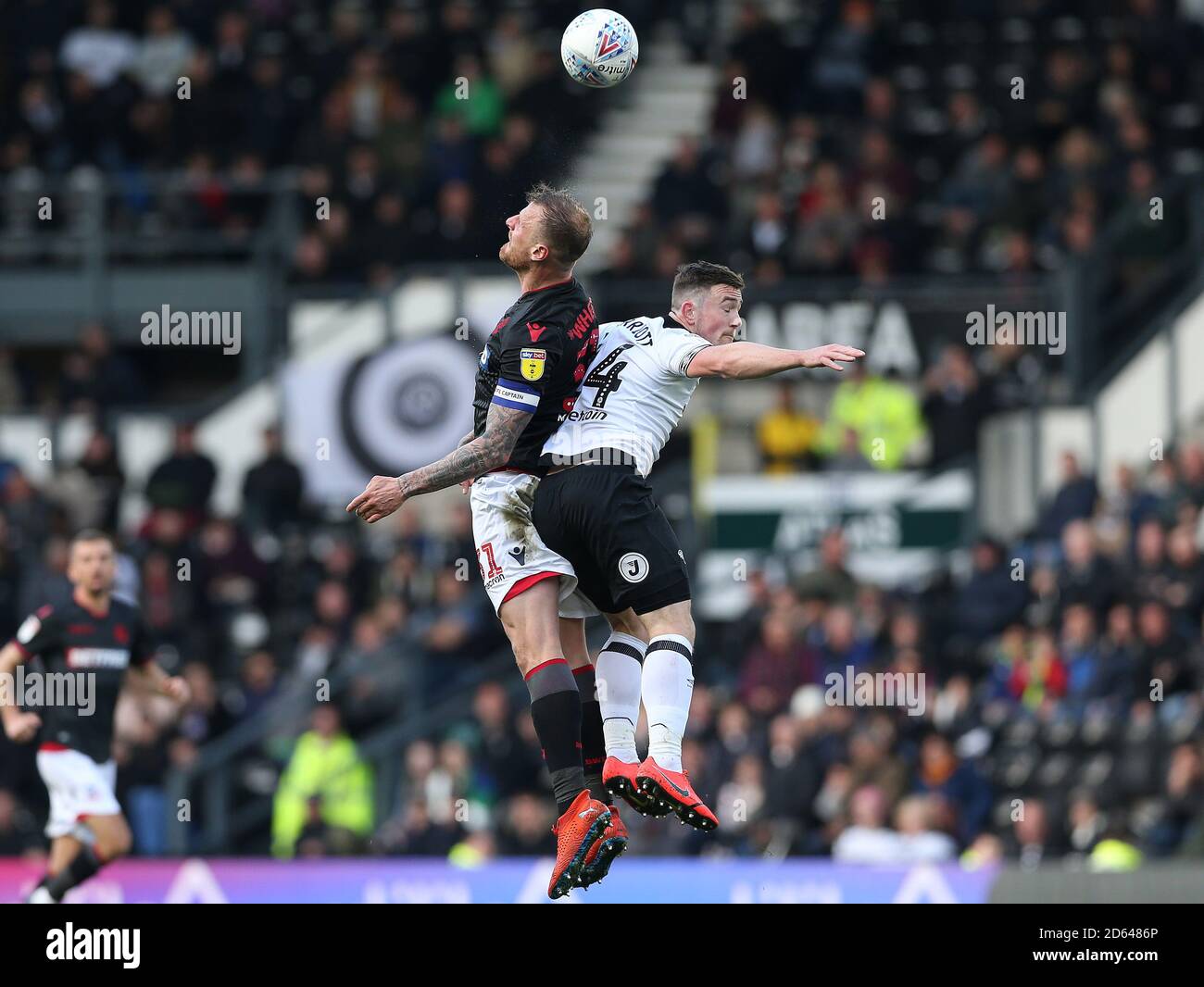 Derby County's Jack Marriott (left) and Bolton Wanderers' David Wheater ...