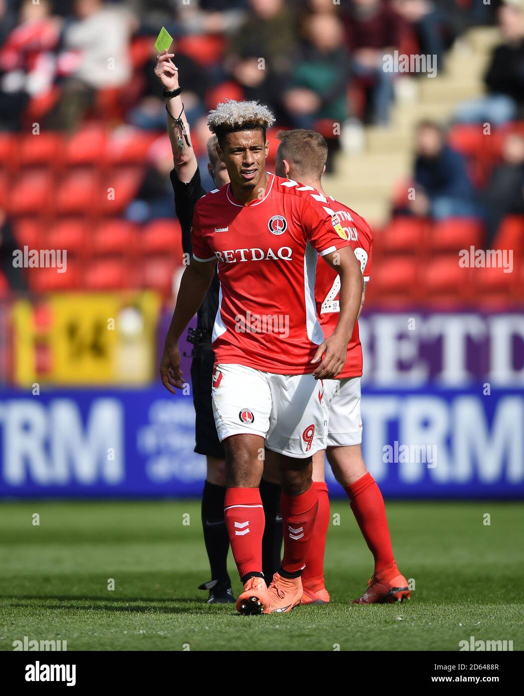 Charlton Athletic's Lyle Taylor is booked by referee Gavin Ward Stock ...