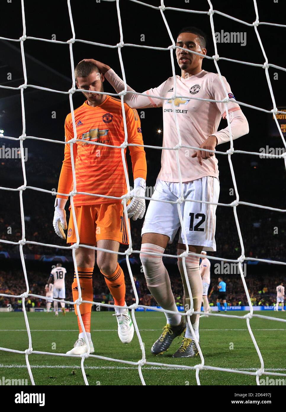 Manchester United's Chris Smalling consoles team-mate, goalkeeper David ...