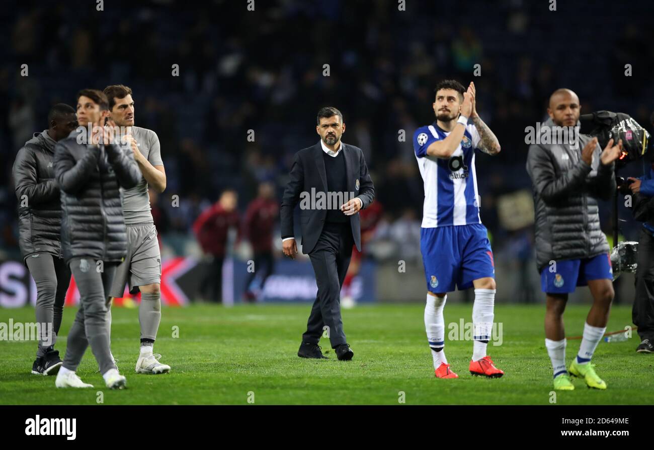 Porto manager Sergio Conceicao (centre) reacts after the final whistle ...