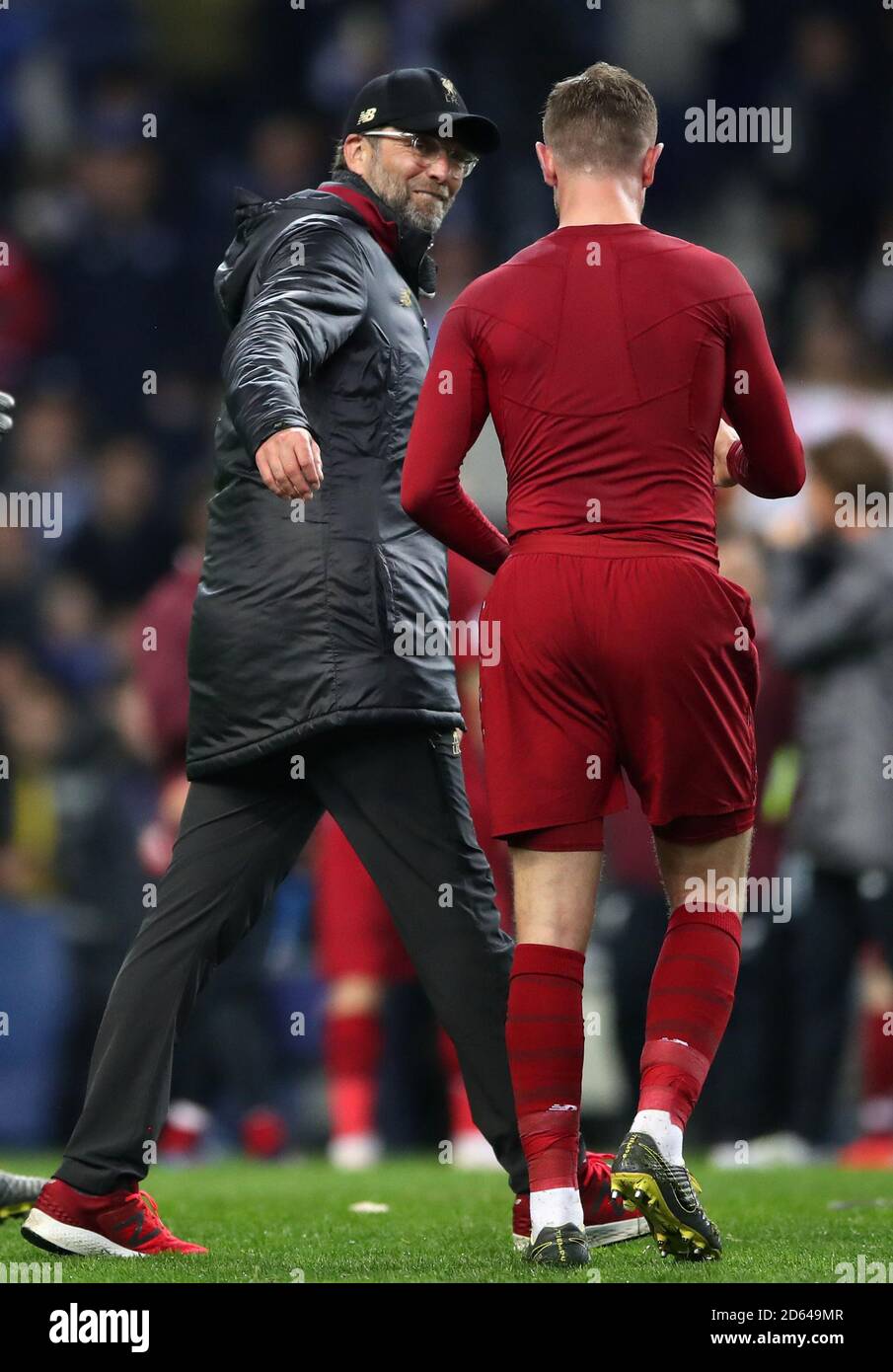 Liverpool manager Jurgen Klopp (left) and Liverpool's Jordan Henderson react after the final ...