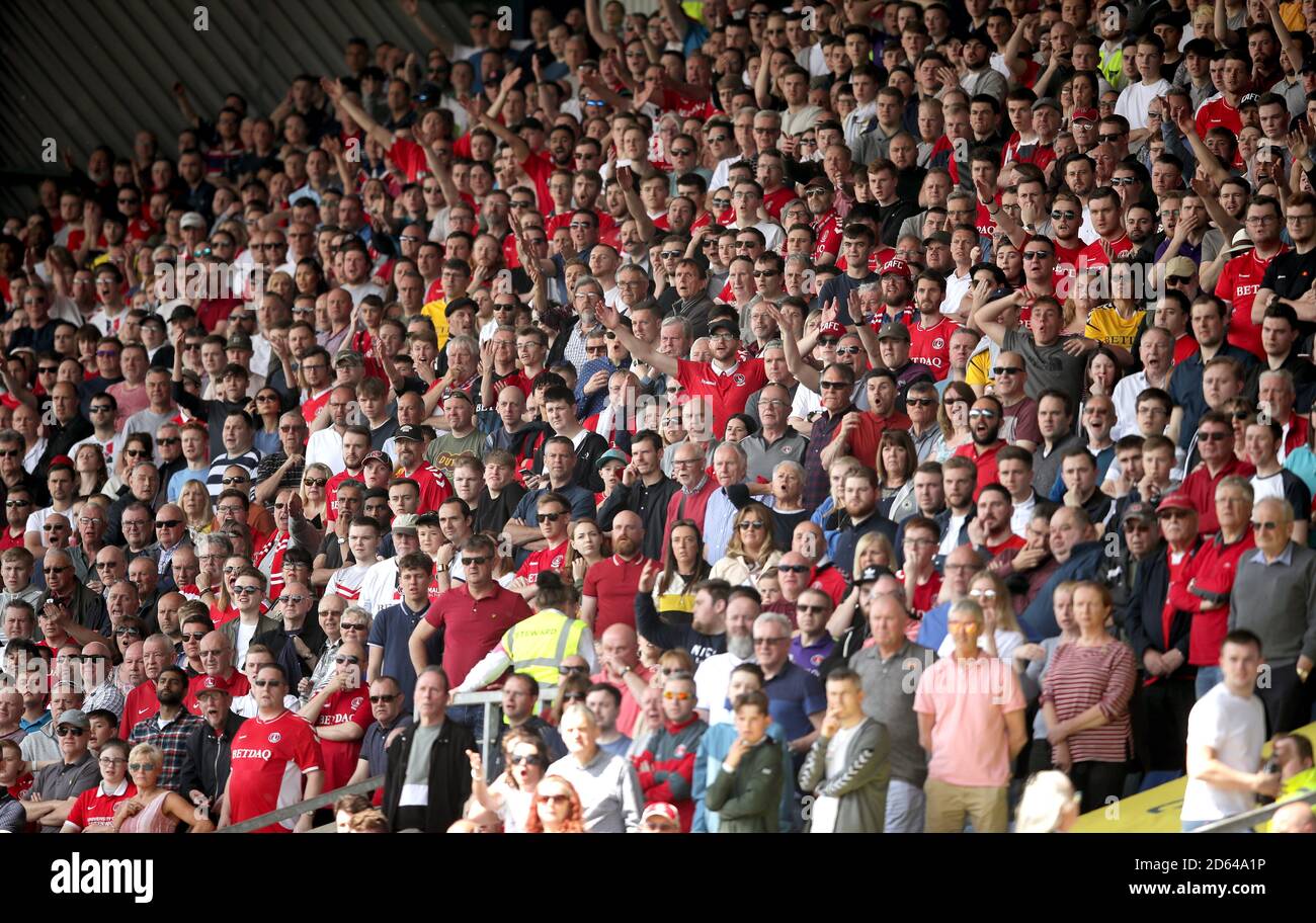 Charlton fans watch match action from the stands Stock Photo - Alamy