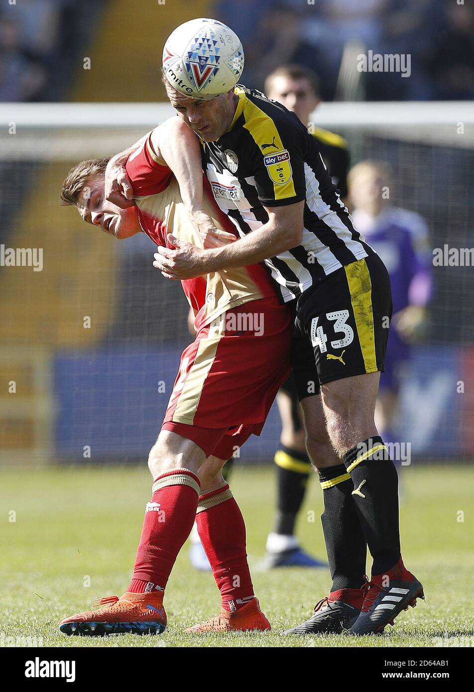 Notts County's Michael Doyle (right) challenges Milton Keynes Dons ...