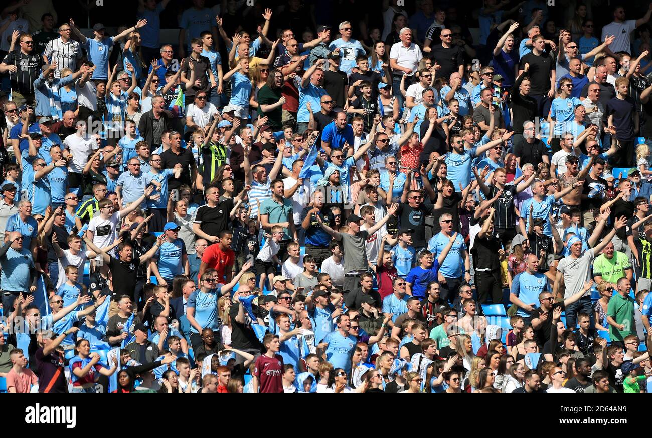 Manchester City fans react from the stands Stock Photo - Alamy