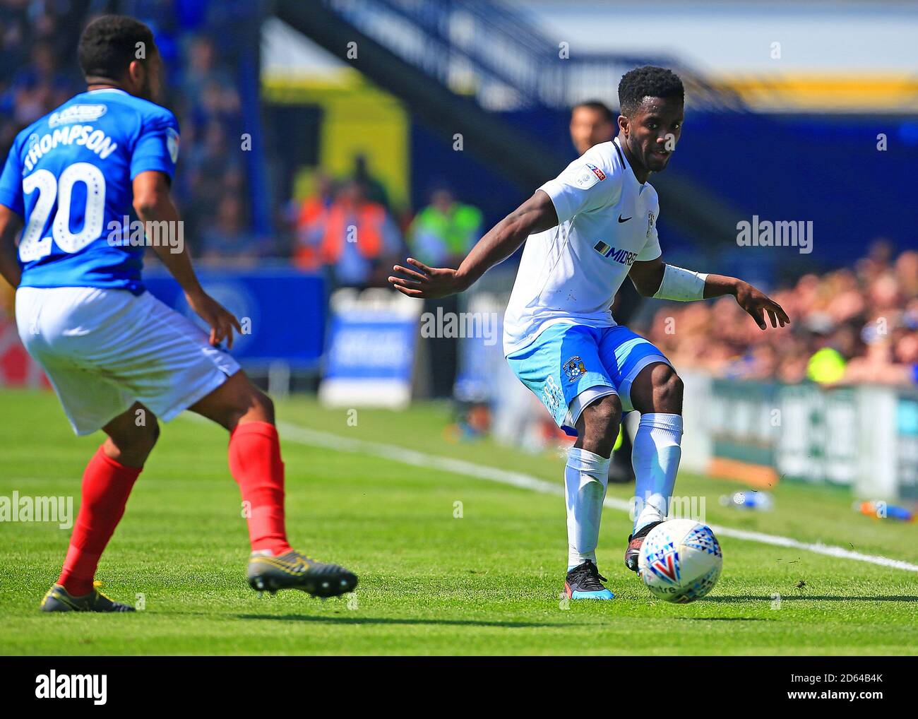 Coventry's Brandon Mason knock the ball down the touch line Stock Photo ...