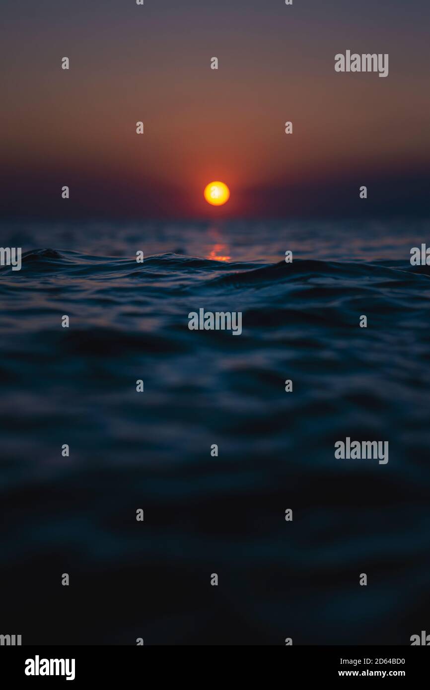 Sunset over the waves hi-res stock photography and images - Alamy