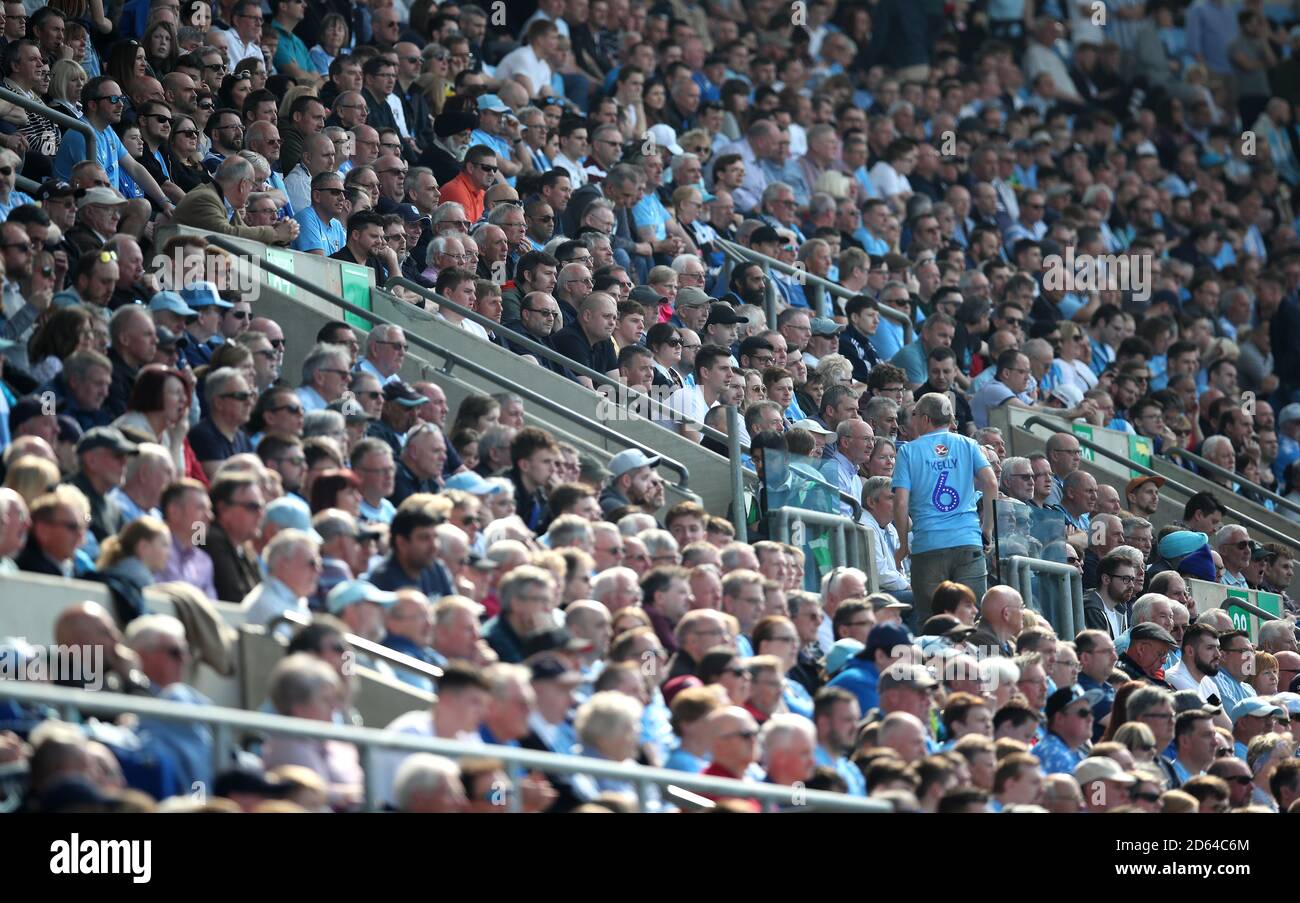 Coventry City fans in the stands Stock Photo - Alamy