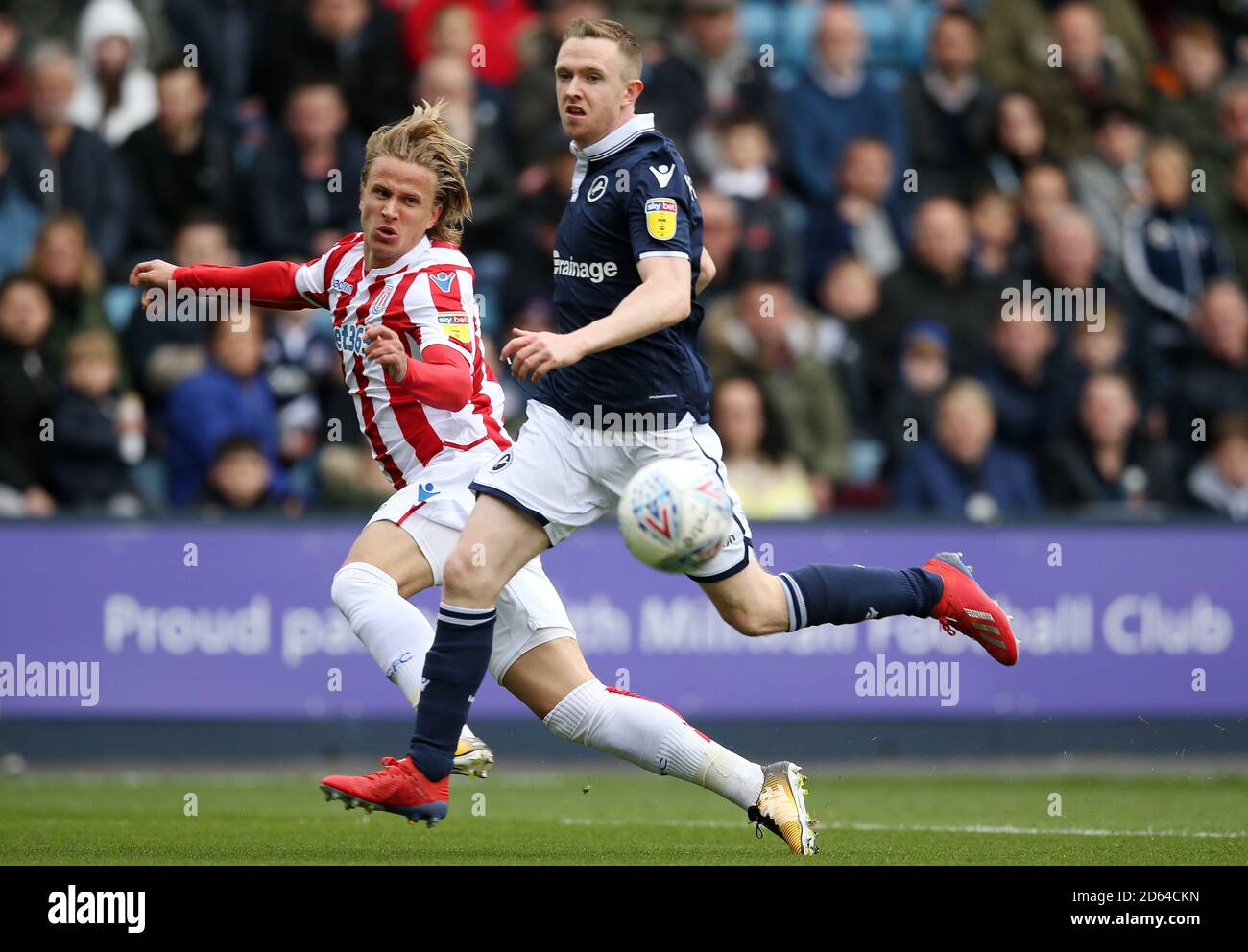 Stoke City's Moritz Bauer (left) and Millwall's Shane Ferguson battle ...