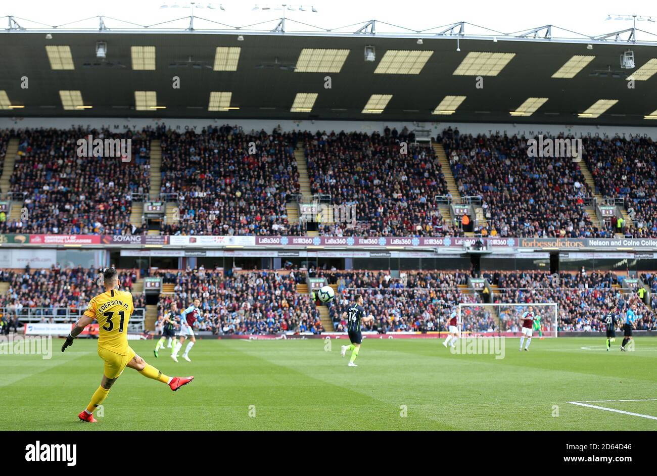 Manchester City goalkeeper Ederson kicks the ball down the field Stock ...