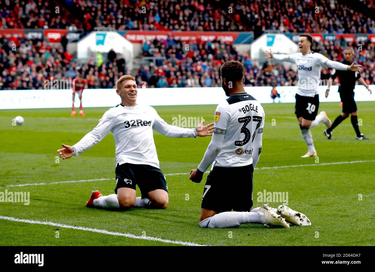 Derby County's Jayden Bogle (right) celebrates scoring his side's ...