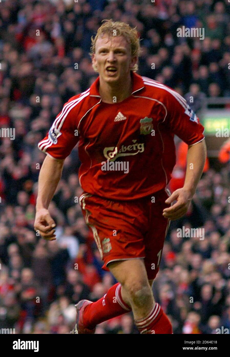Liverpool's Dirk Kuyt celebrates scoring the third goal against Bolton ...