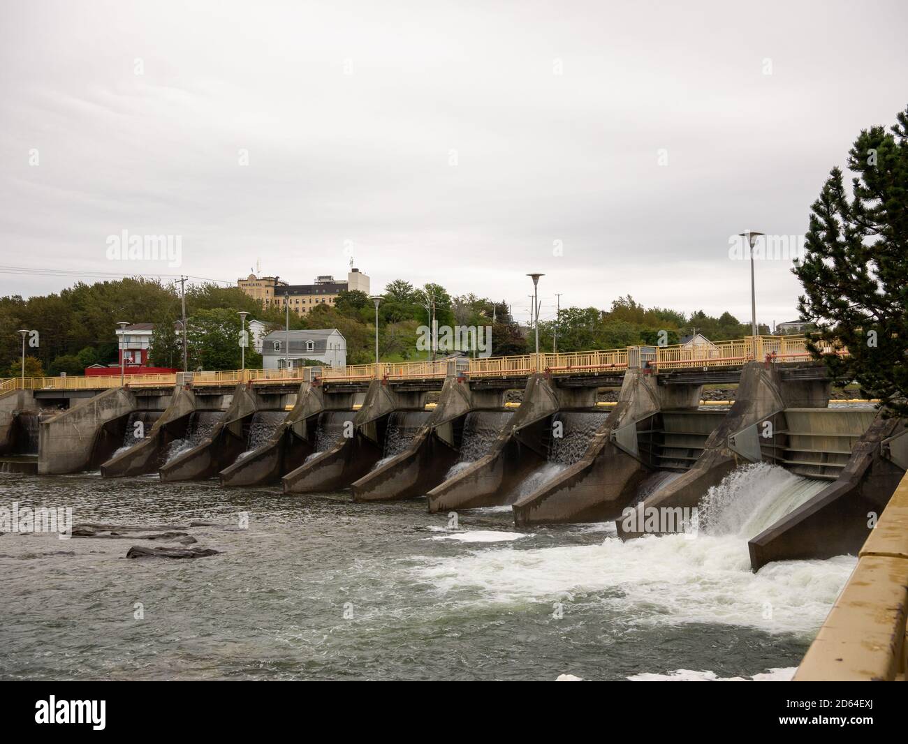 This dam controls lake water levels int he middle of a city Stock Photo ...