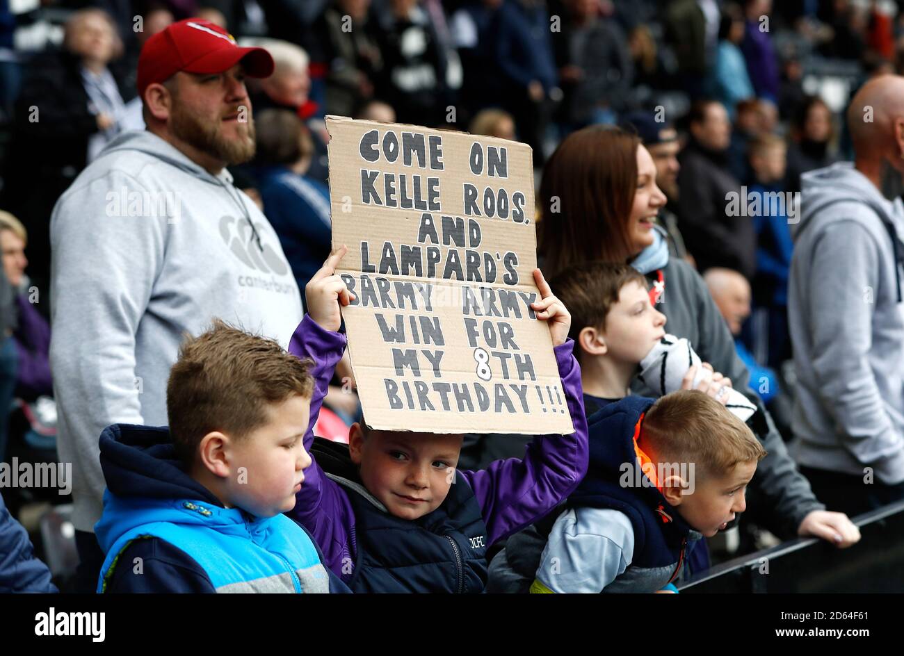 A Derby County fan holds up a banner Stock Photo - Alamy