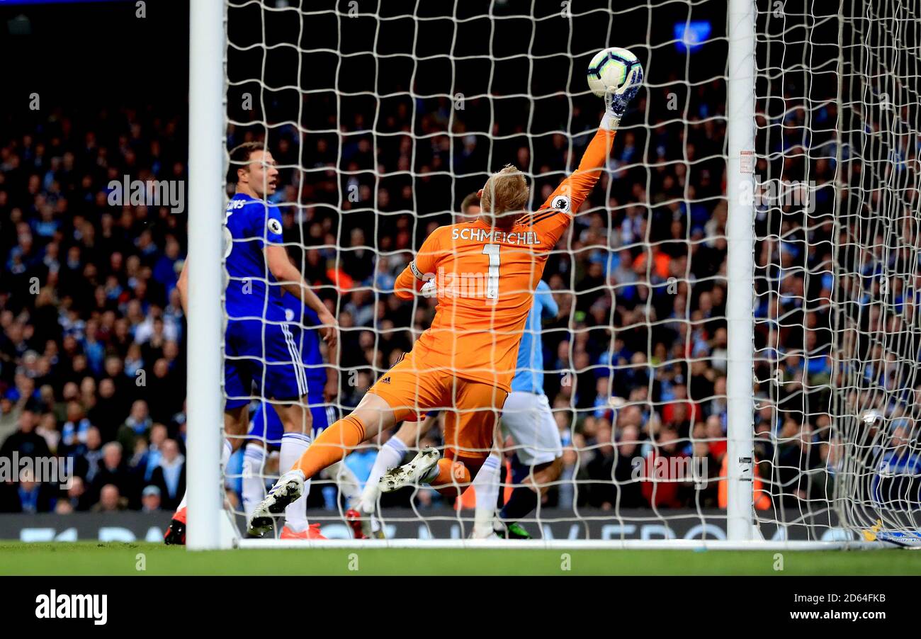 Leicester City goalkeeper Kasper Schmeichel makes a save Stock Photo ...