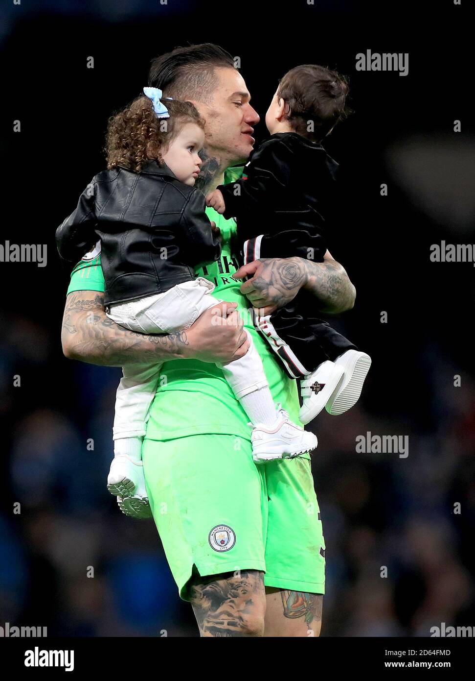 Manchester City goalkeeper Ederson with children after the final ...