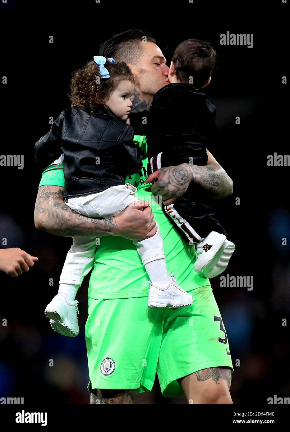 Manchester City goalkeeper Ederson with children after the final ...