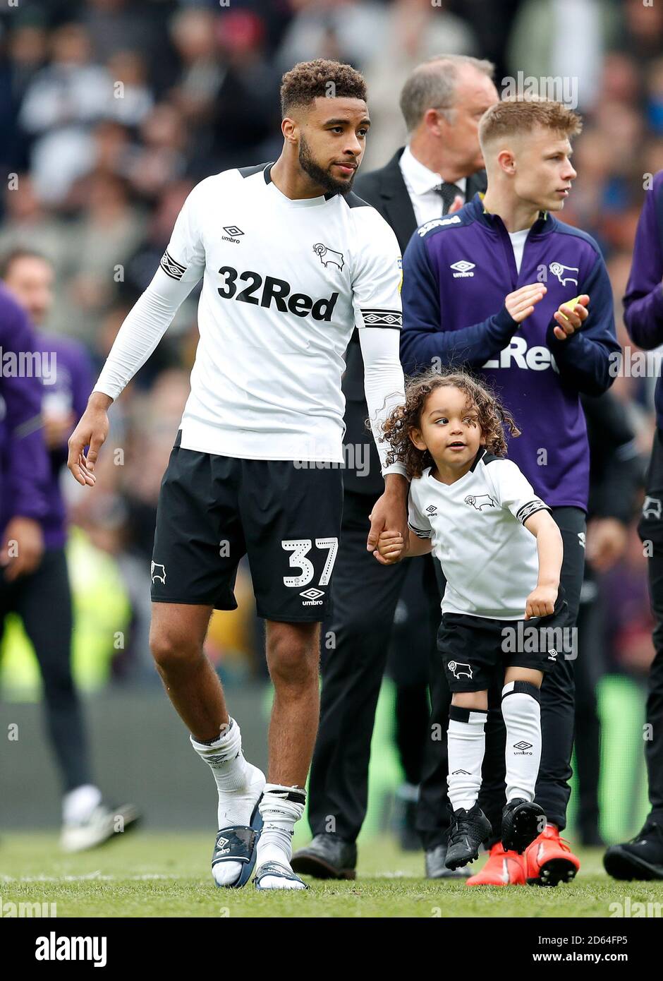 Derby County's Jayden Bogle celebrates with his family after the game ...
