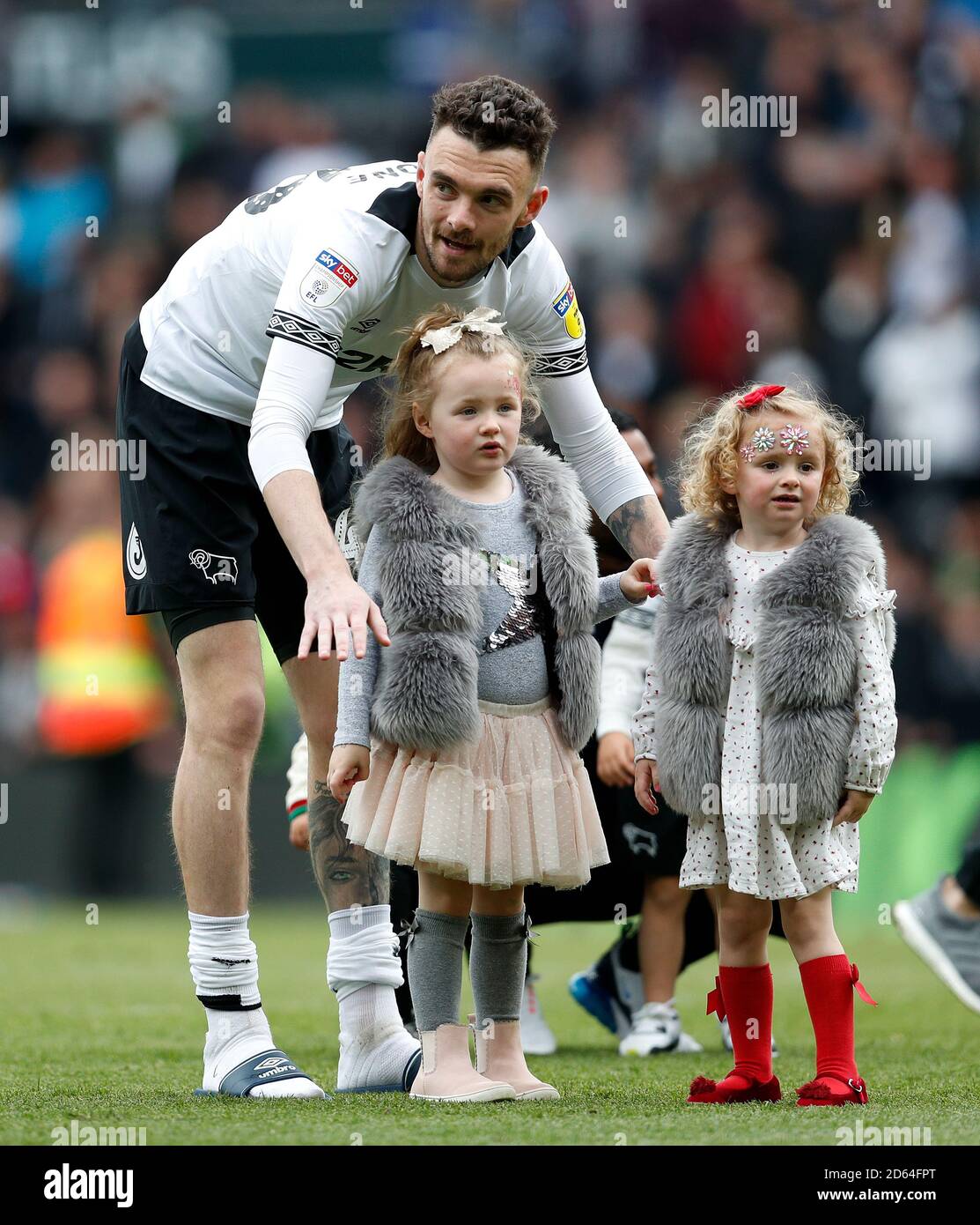 Derby County's Scott Malone celebrates with his family after the game ...
