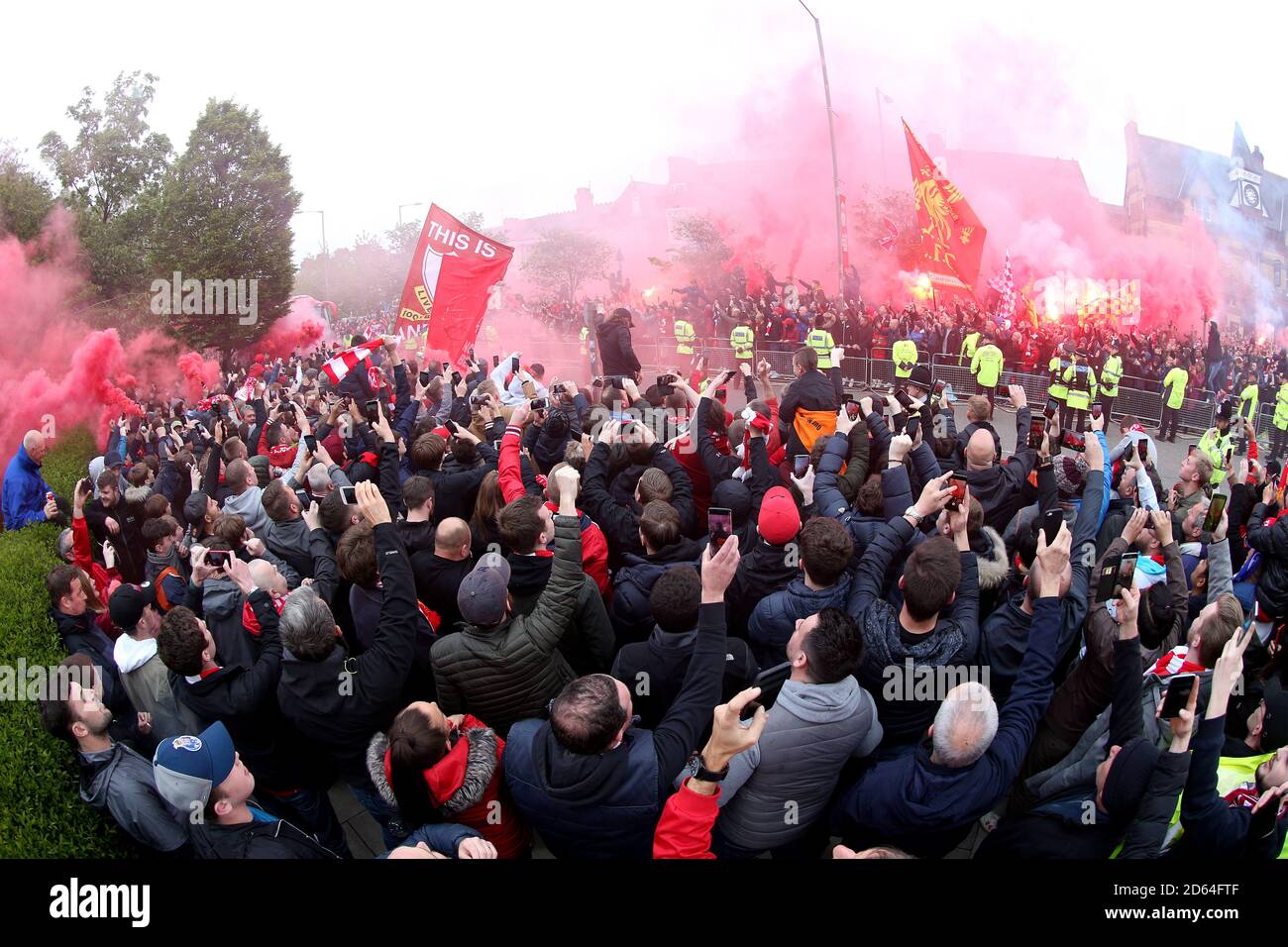 Liverpool fans show support for their team outside Anfield Stock Photo ...