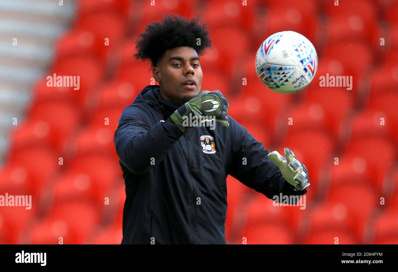 Coventry City goalkeeper Corey Addai warming up prior to kick-off Stock ...
