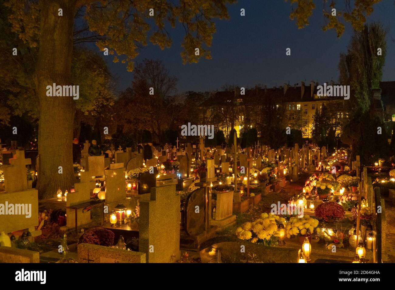 Endless grave lantern lights at cemetery in Poland Stock Photo - Alamy