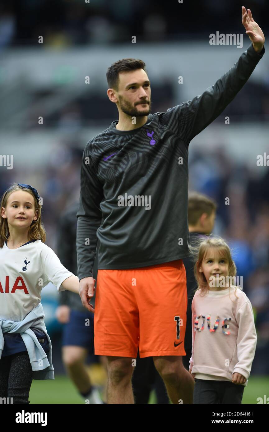 Tottenham Hotspur goalkeeper Hugo Lloris and his family on the lap of ...