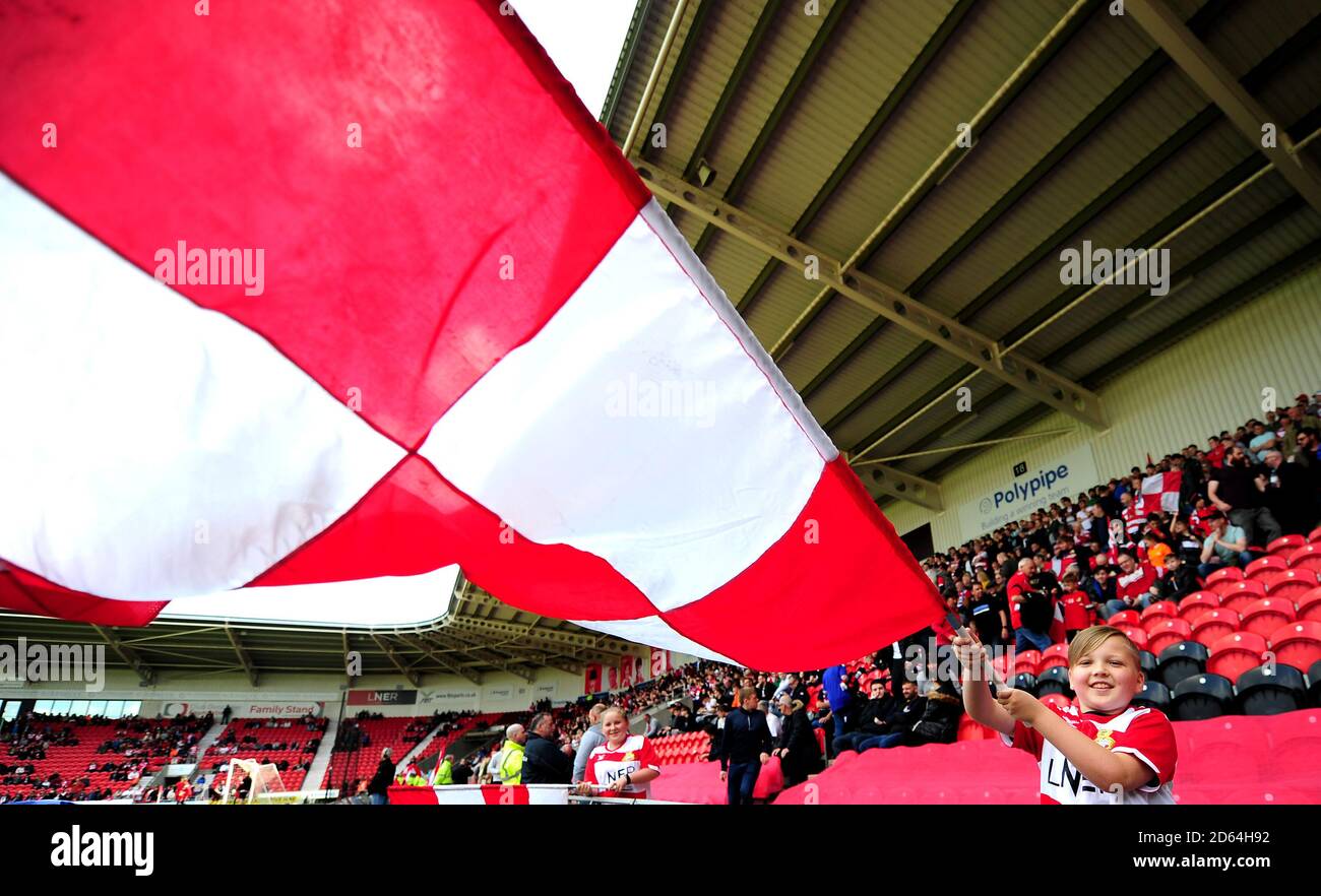 A young Charlton Athletic fan shows his support in the stands Stock ...