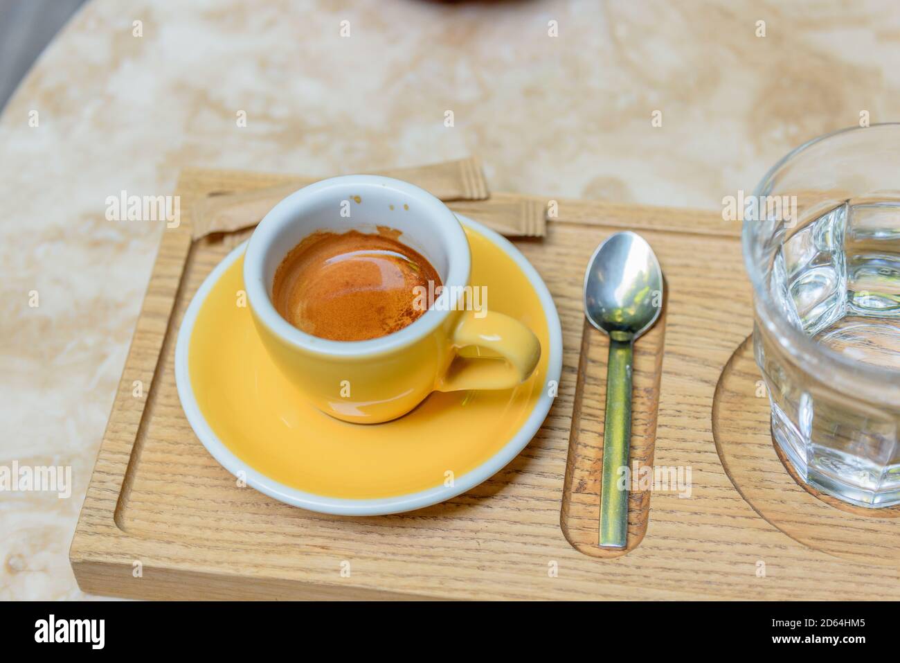 Coffee. Yellow cup with epresso coffee. yellow coffee cup. food concept Stock Photo - Alamy
