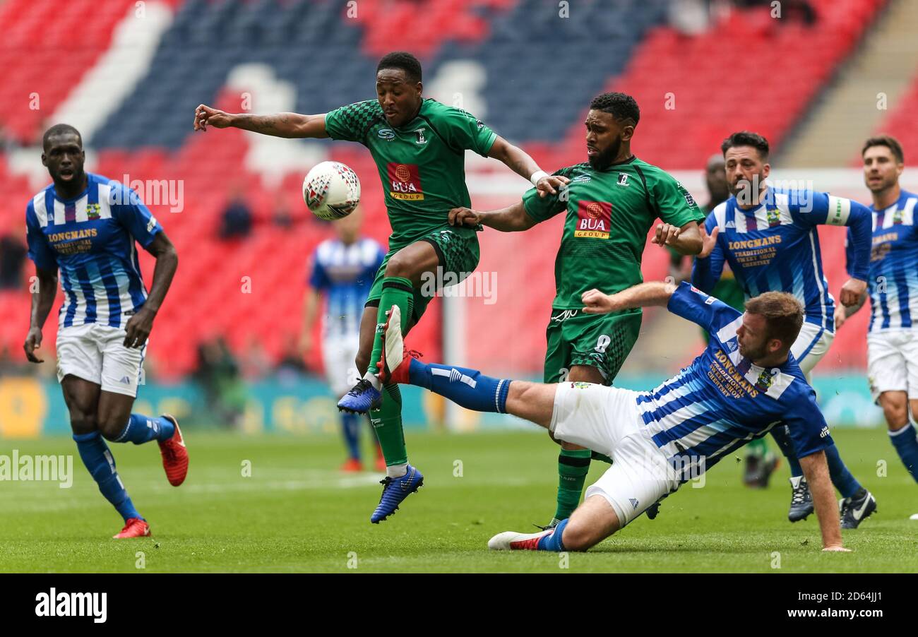 Chertsey Town's Michael Peacock and Cray Valley's Anthony Edgar battle ...